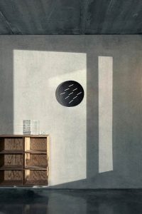 ClockClock 9 is both a kinetic sculpture and a functioning wall clock ...